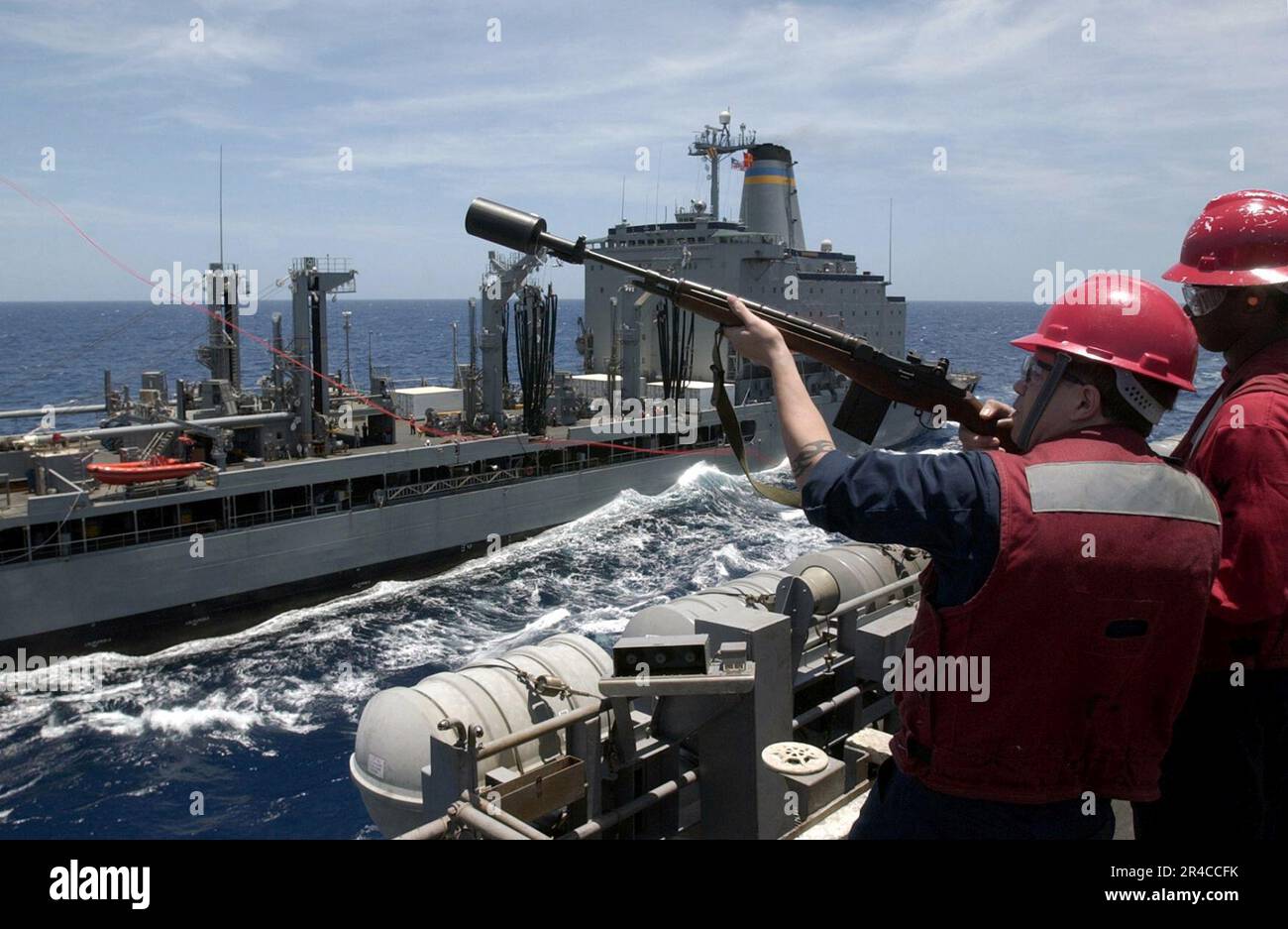 US Navy In preparation for taking on fuel from the Military Sealift ...