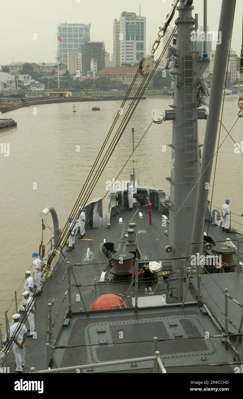 US Navy Sailors man the rails aboard the rescue and salvage ship USS ...