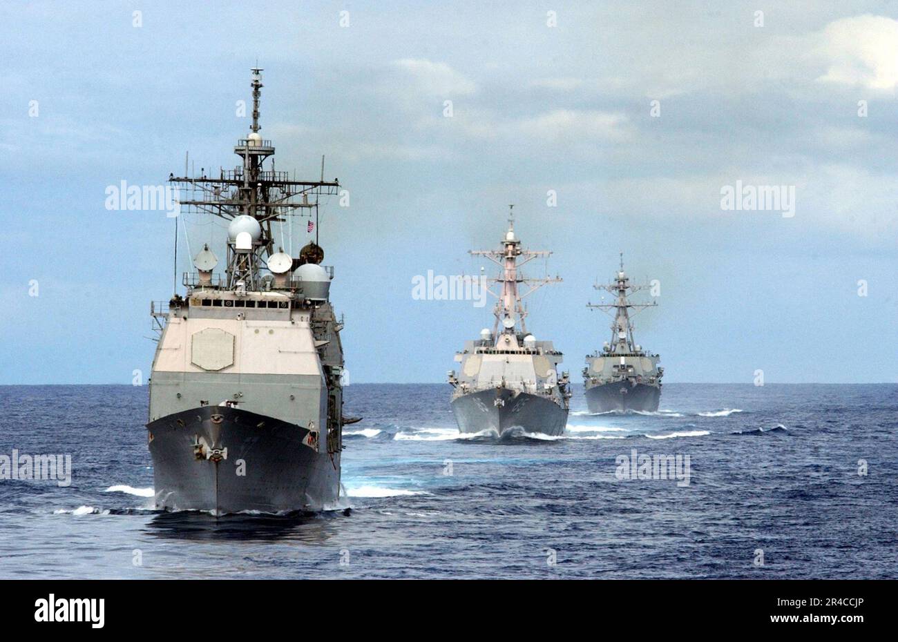 US Navy The guided-missile cruiser USS Lake Champlain (CG 57) leads the ...