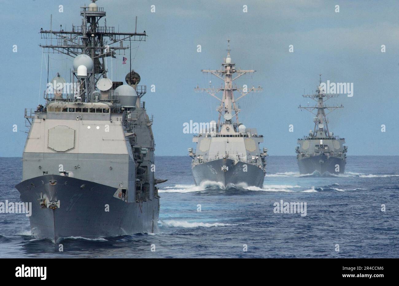 US Navy The guided-missile cruiser USS Lake Champlain (CG 57) leads the ...