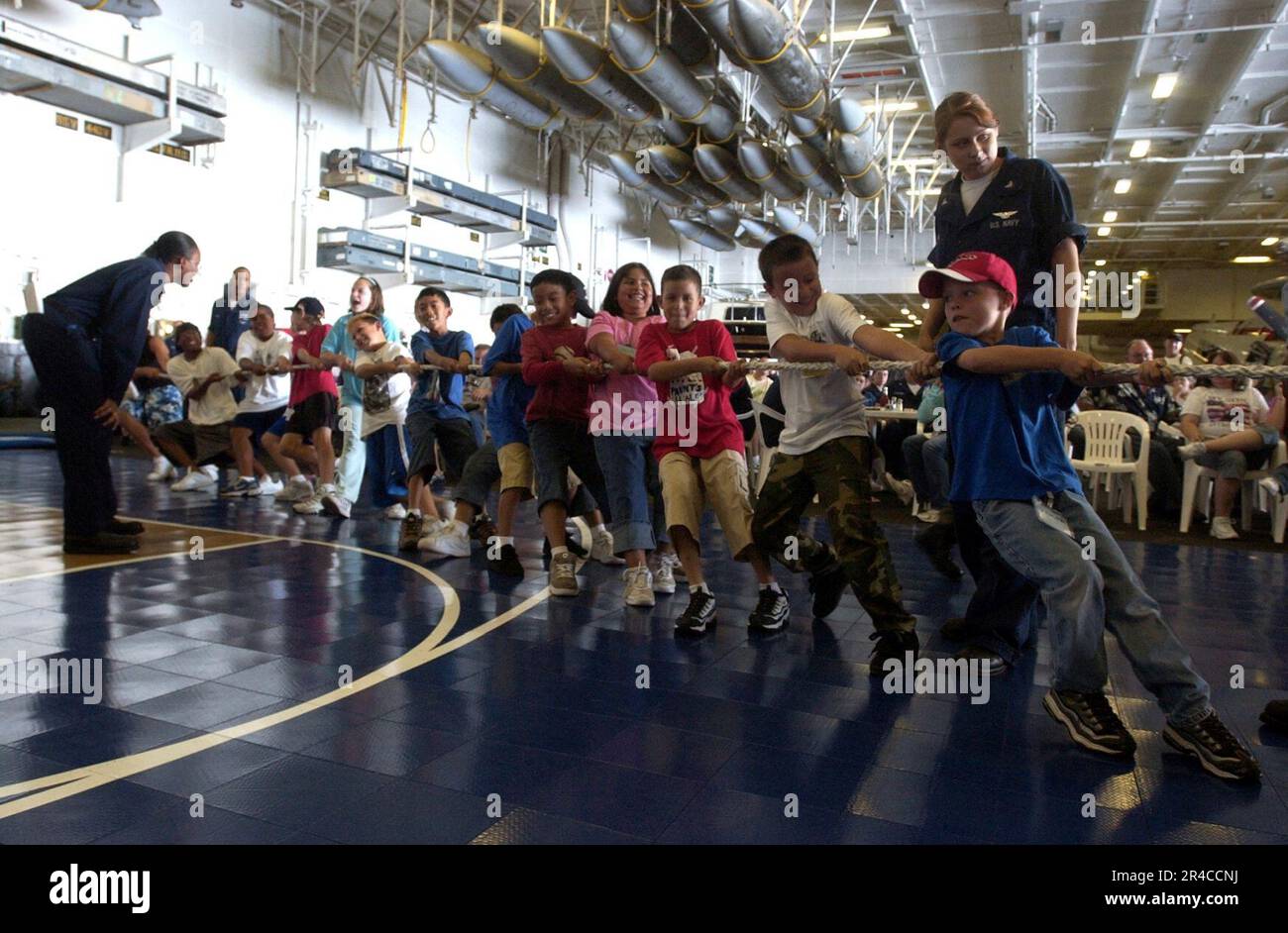 US Navy In the hangar bay aboard the Nimitz-class aircraft carrier USS ...