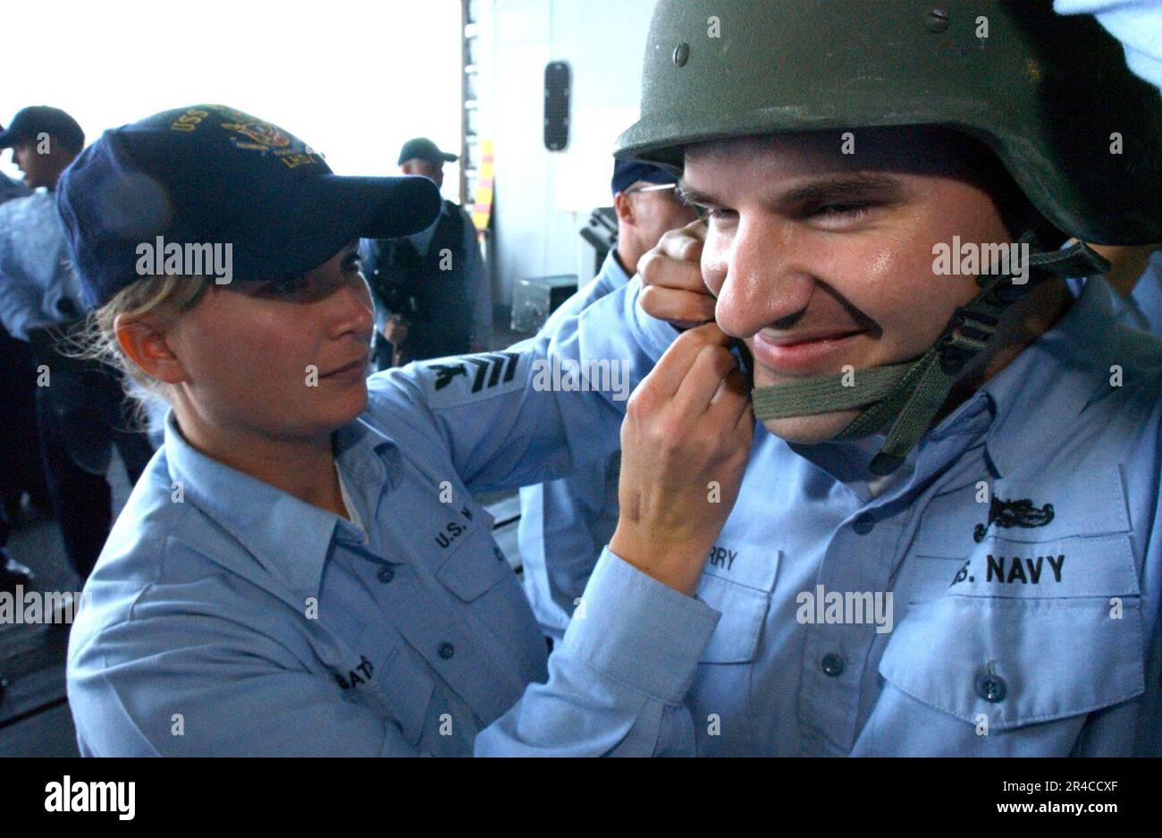 US Navy Information Systems Technician 1st Class tightens Fire ...