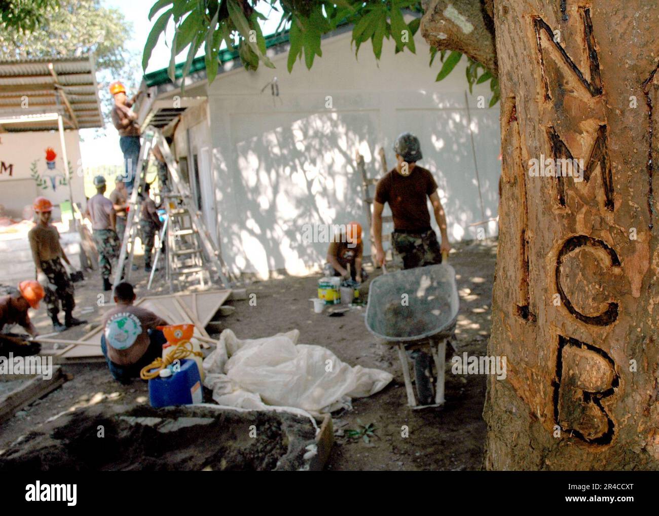 US Navy Naval Mobile Construction Battalion One (NMCB-1) Seabees work ...