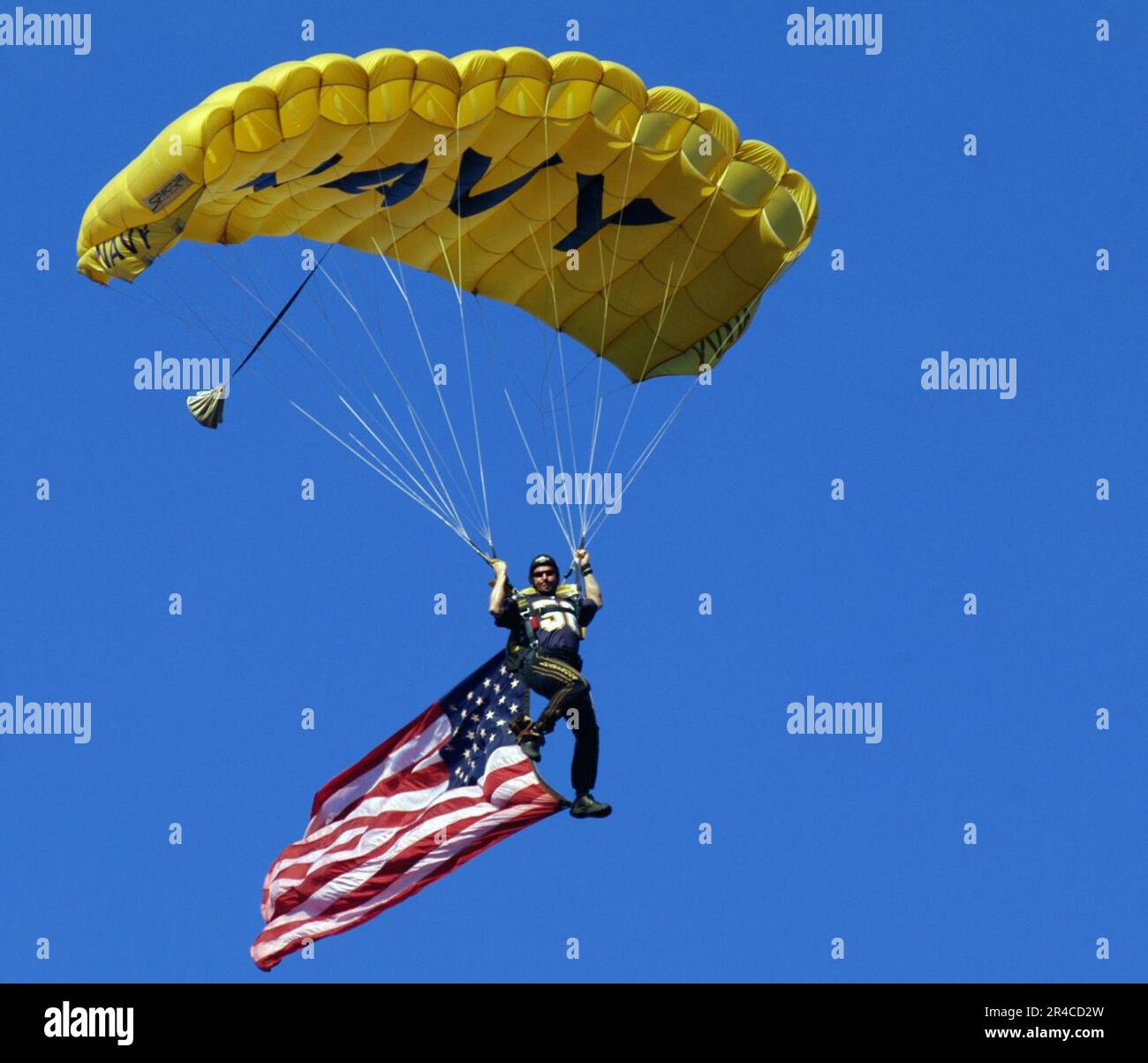 US Navy A U.S. Navy Leap Frogs Parachute team member descends into ...