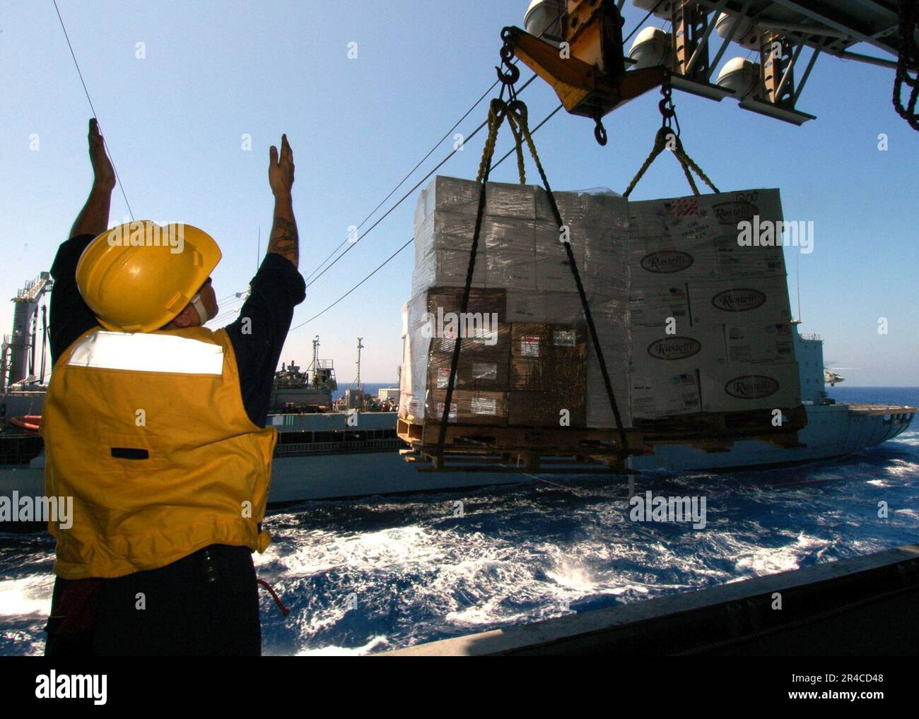US Navy Boatswain's Mate 2nd Class provides a visual reference to the ...