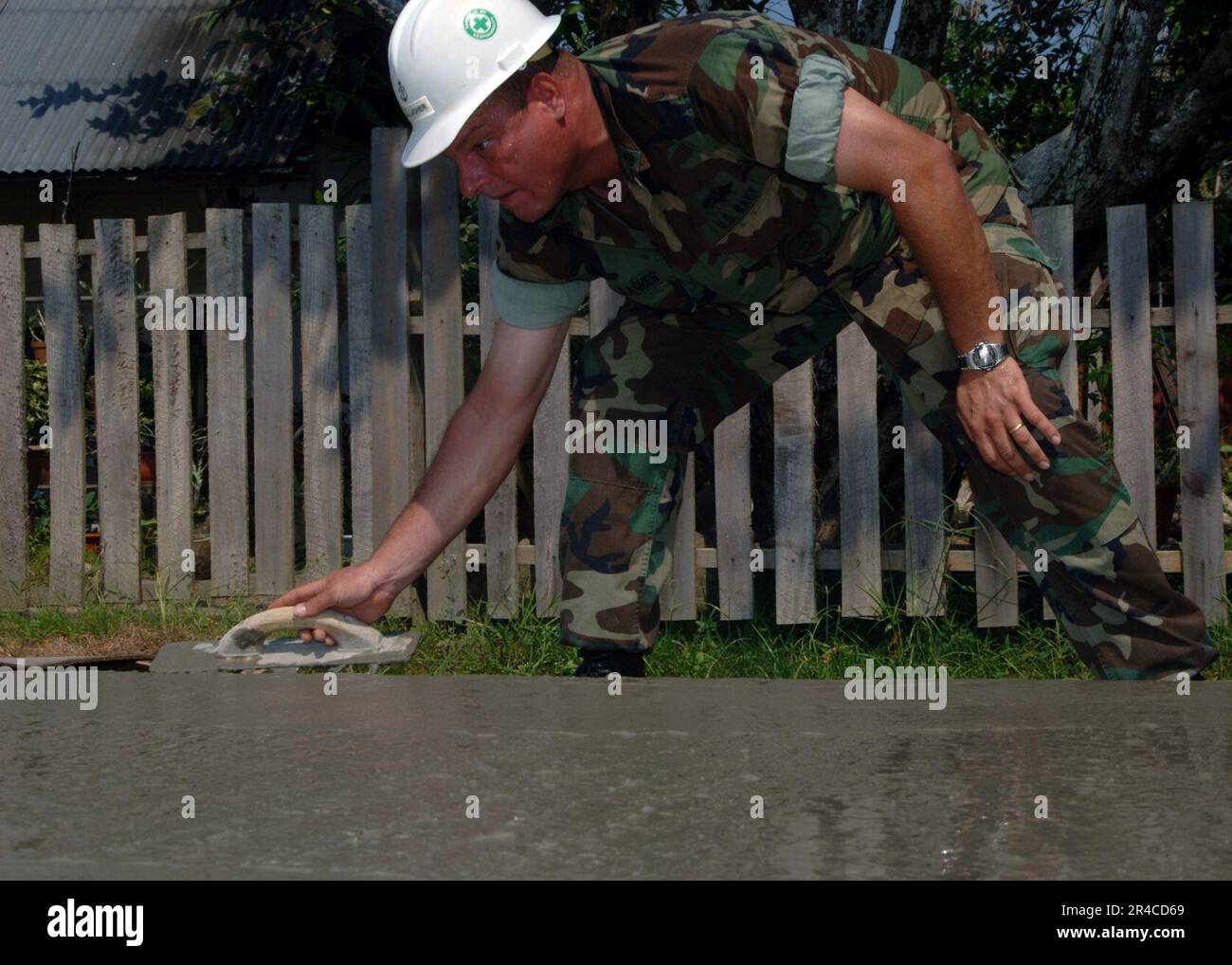 US Navy U.S. Navy Chief Construction Electrician levels out freshly ...