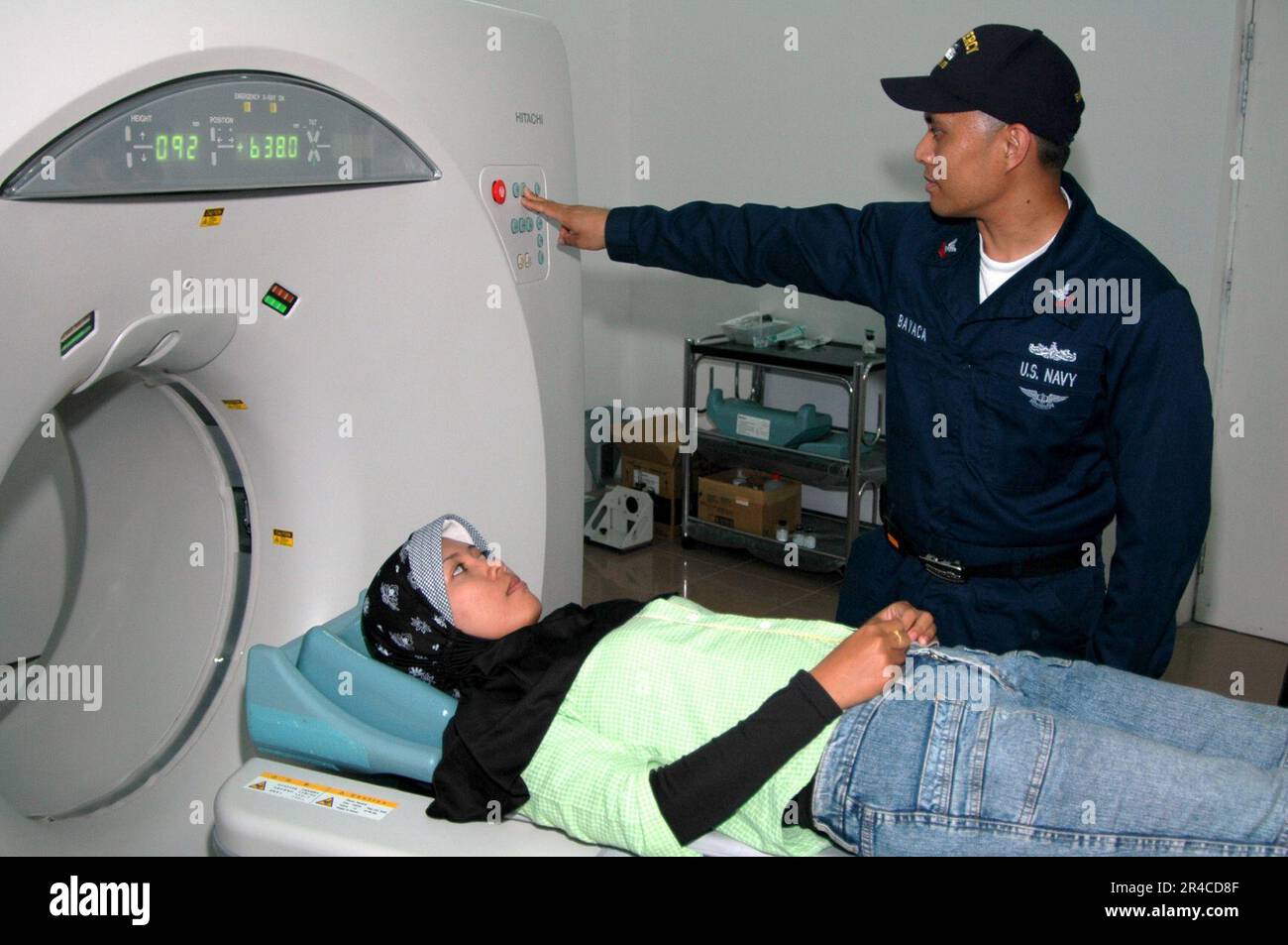 US Navy Navy Hospital Corpsman 2nd Class demonstrates how to use a CT ...