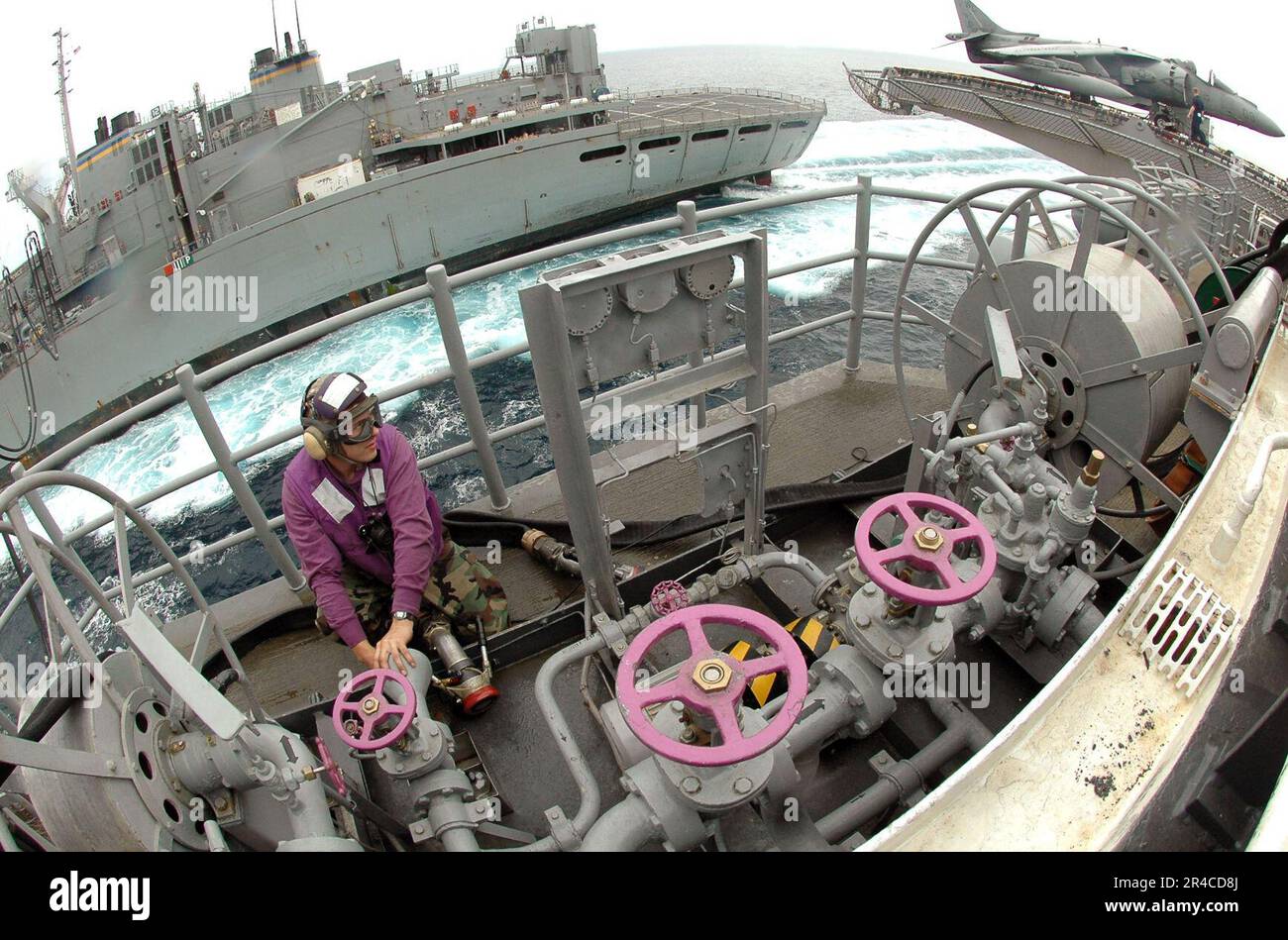 US Navy Aviation Boatswain's Mate Fuels Airman stands a fuels watch ...