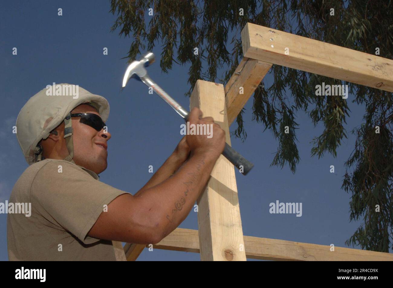 Us Navy A Seabee Assigned To Naval Mobile Construction Battalion Four
