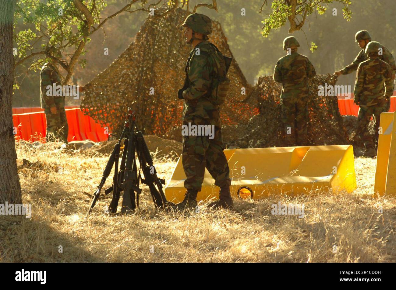 US Navy Storekeeper Seaman Apprentice stands a weapons watch while the ...