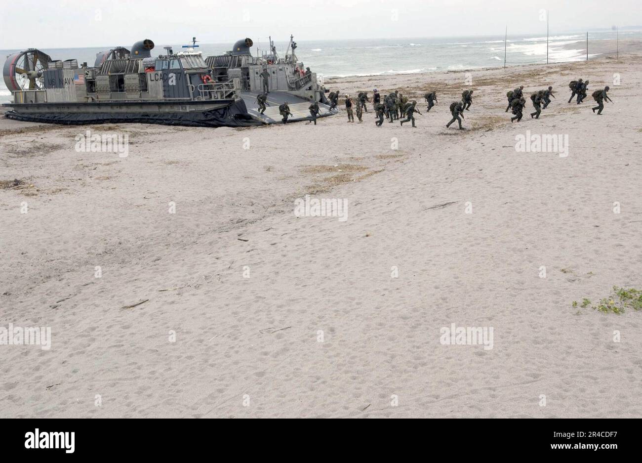 US Navy Philippine Marines debark landing craft air cushion Five Seven ...