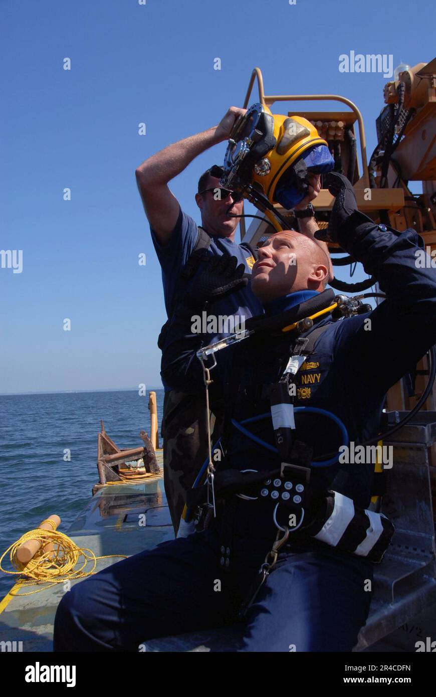 US Navy Chief Warrant Officer and Hospital Corpsman 1st Class assigned ...
