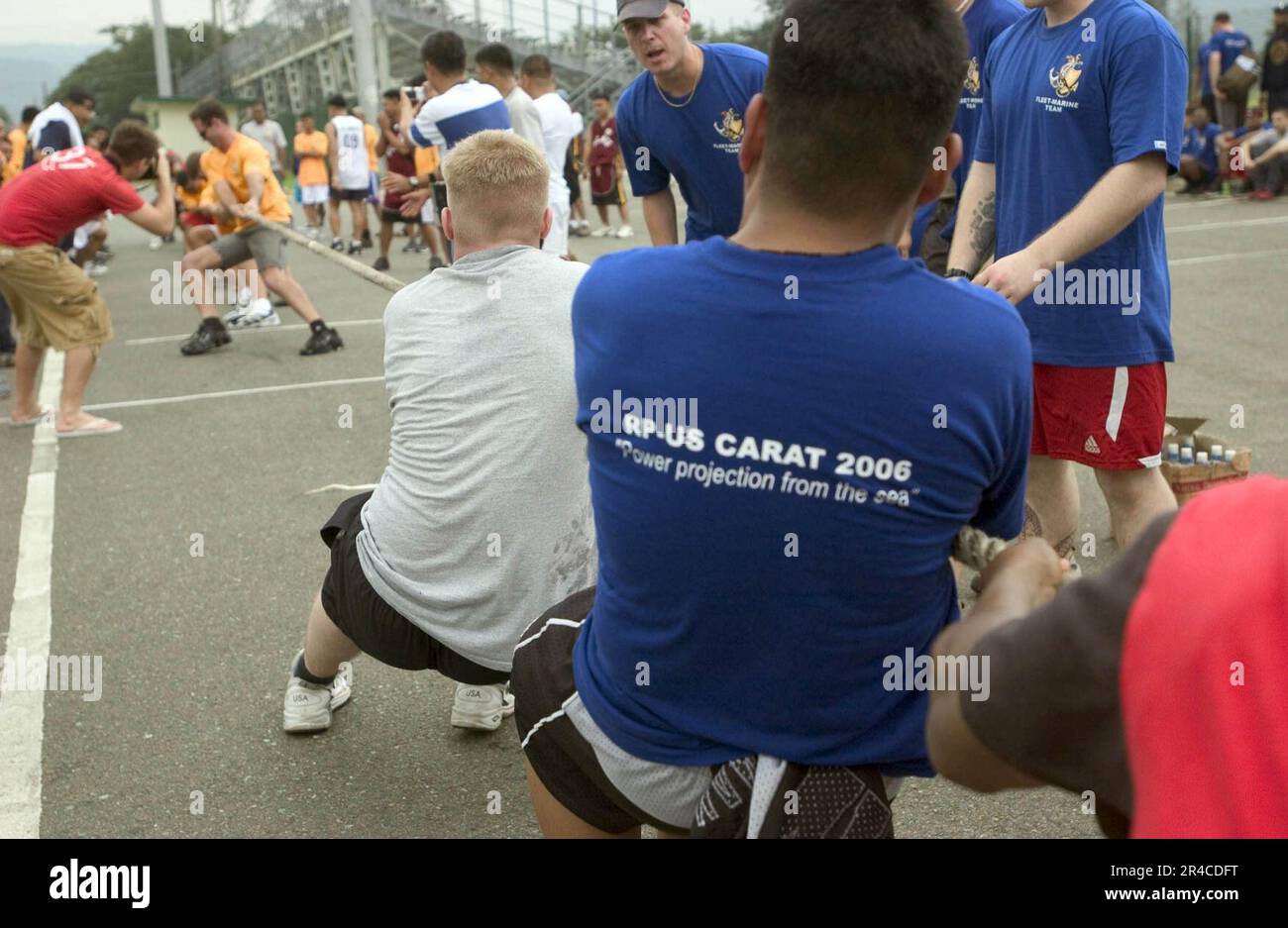 US Navy U.S. and Philippine Navy Sailors compete in tug-of-war as ...