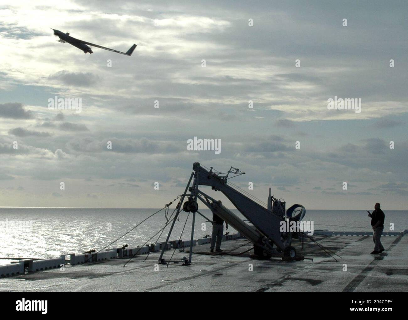 US Navy An Unmanned Aerial Vehicle (UAV) Scan Eagle launches from the ...