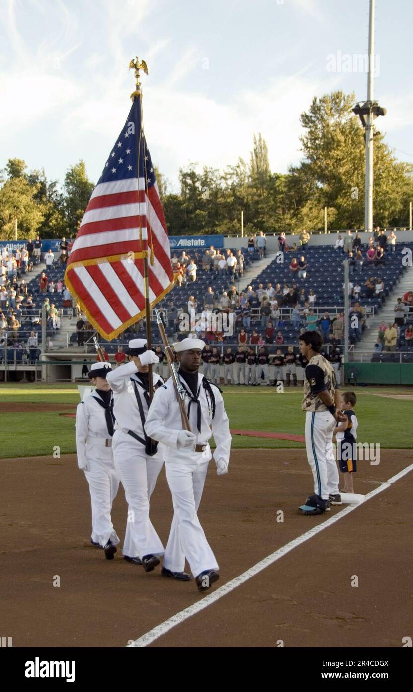 US Navy The Naval Station Everett Color Guard team marches off Everett ...