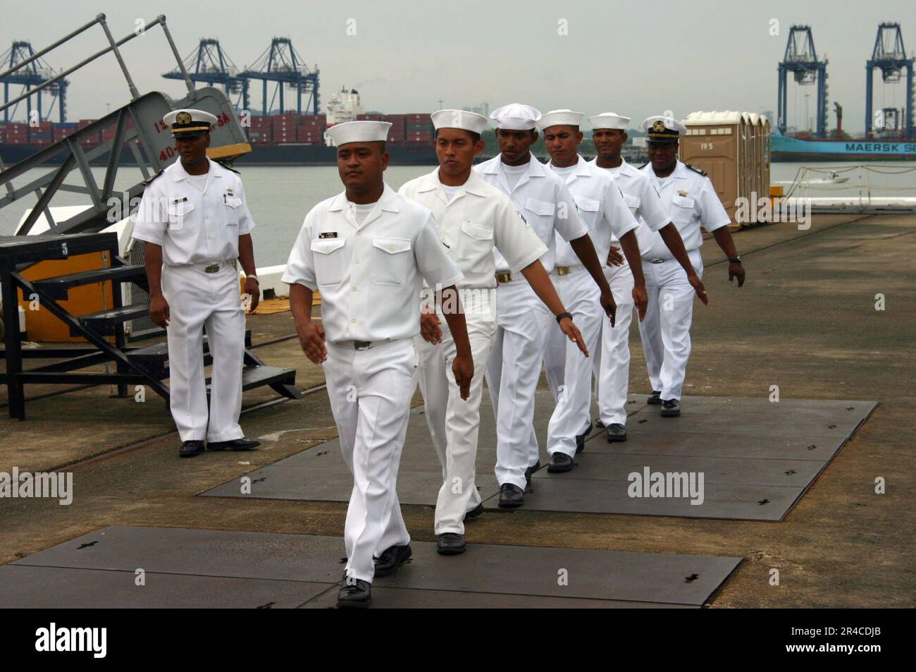 US Navy Panamanian Sailors march on the pier at Rodman base to welcome ...