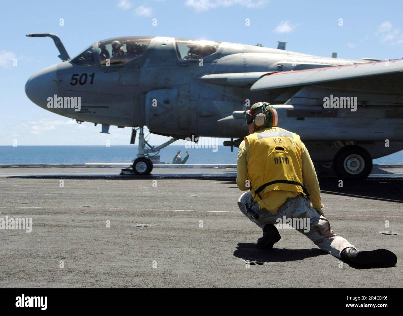 US Navy Lt. Cmdr. prepares to launch an EA-6B Prowler assigned to the ...