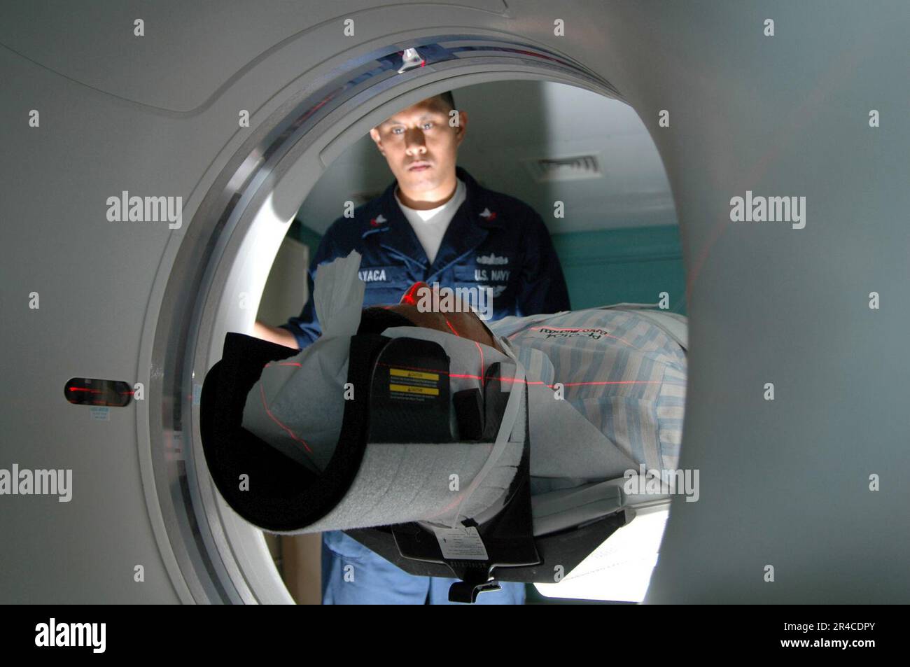 US Navy Navy Hospital Corpsman 2nd Class performs a CAT scan on a ...