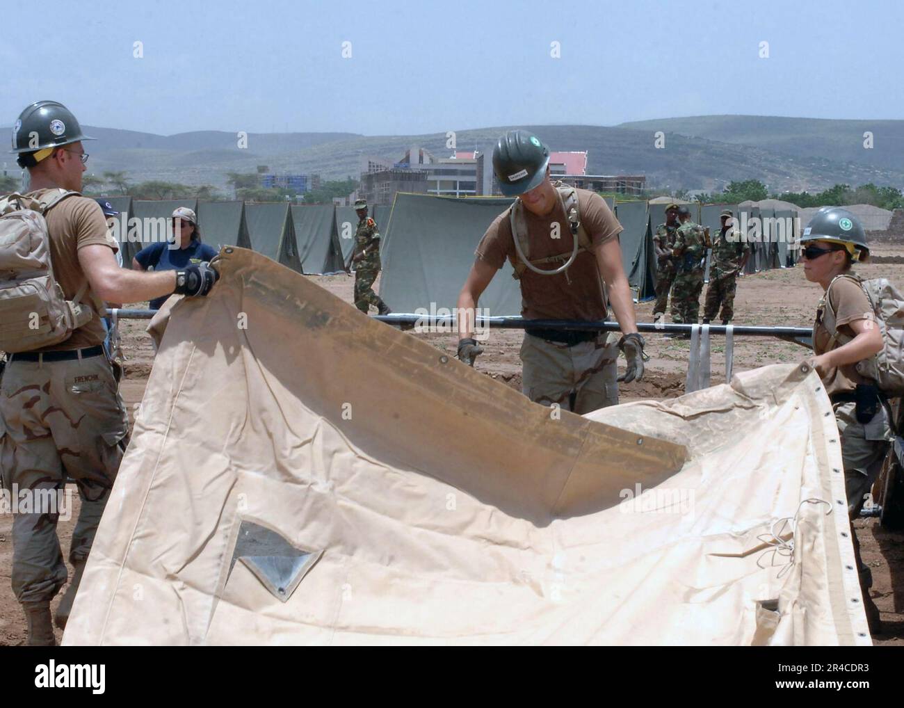 US Navy A team of U.S. Navy Seabees assigned to Naval Mobile ...