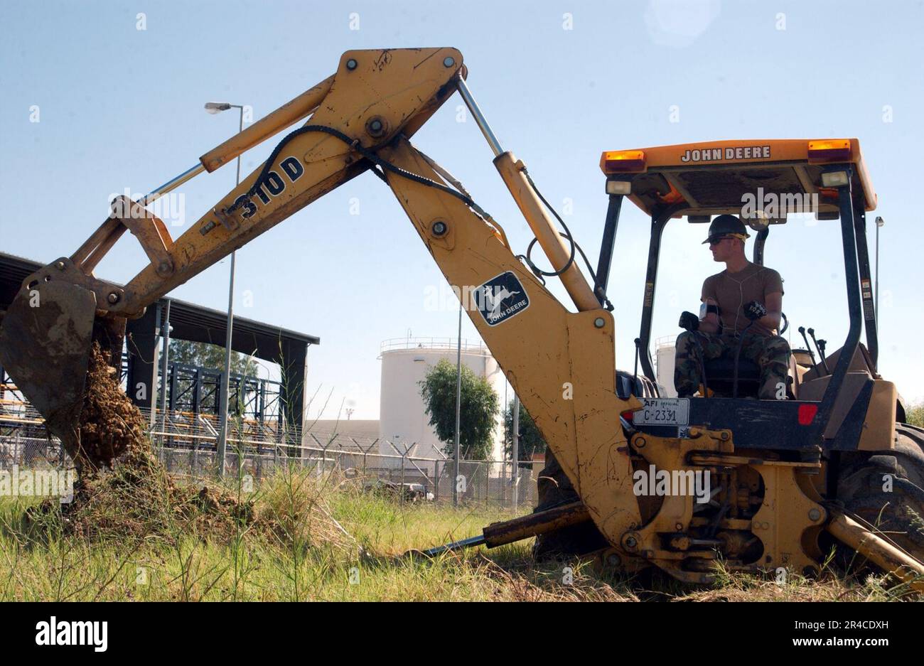 US Navy Equipment Operator 3rd Class assigned to Naval Air Station (NAS ...
