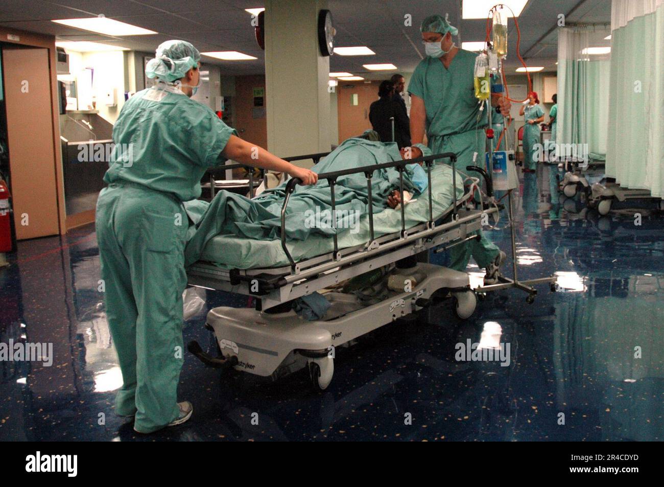 US Navy Medical staff attached to the Medical Treatment Facility aboard ...