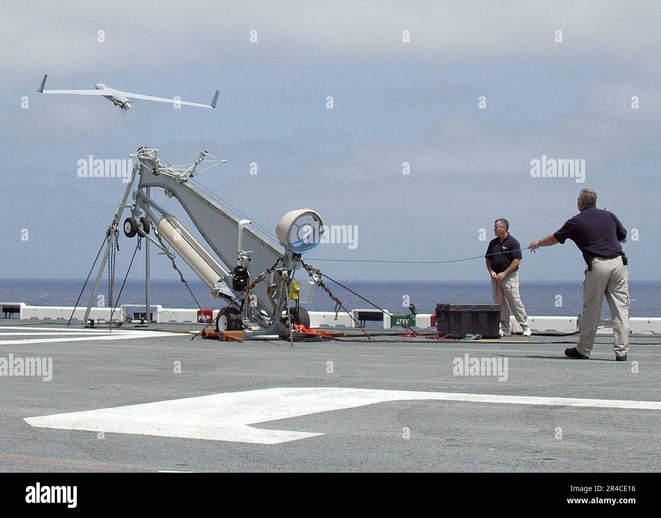 US Navy An Unmanned Aerial Vehicle (UAV) called Scan Eagle launches ...