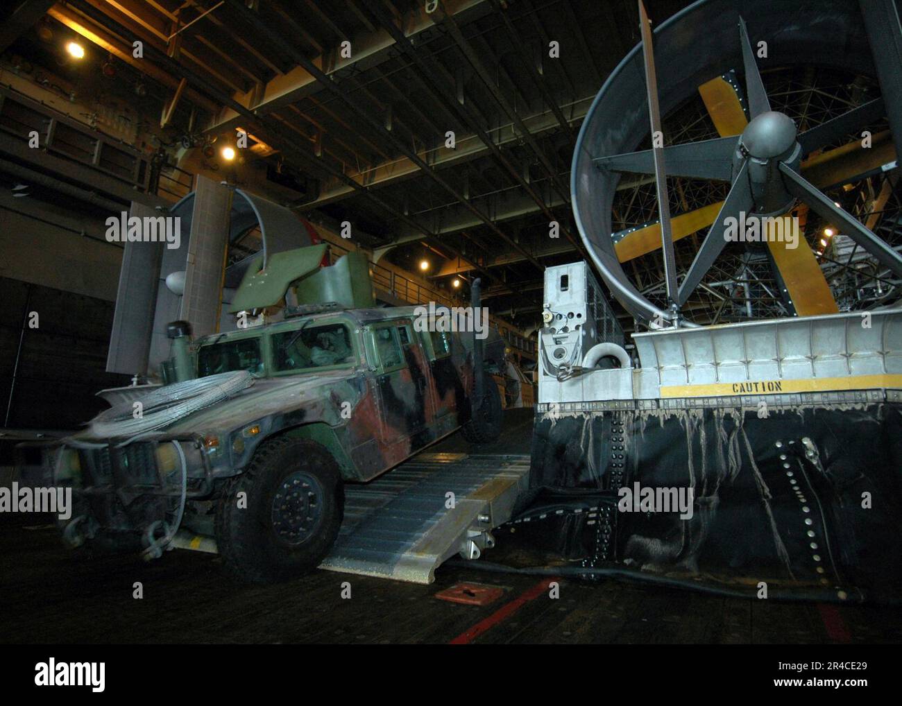 US Navy A U.S. Marine Humvee boards a Landing Craft Air Cushioned (LCAC ...