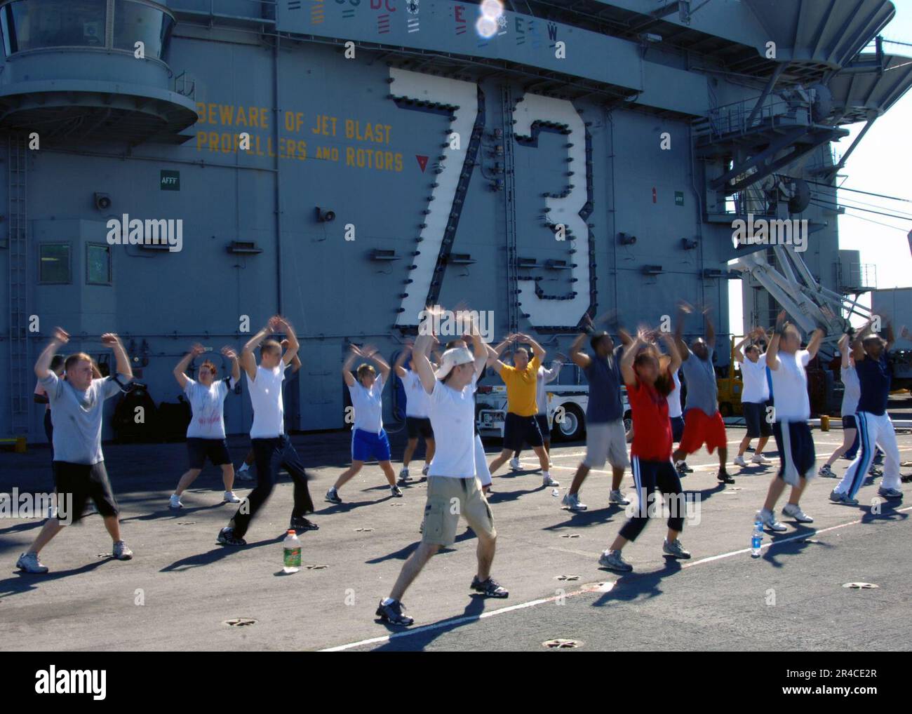 US Navy Sailors participate in a rigorous physical training evolution ...