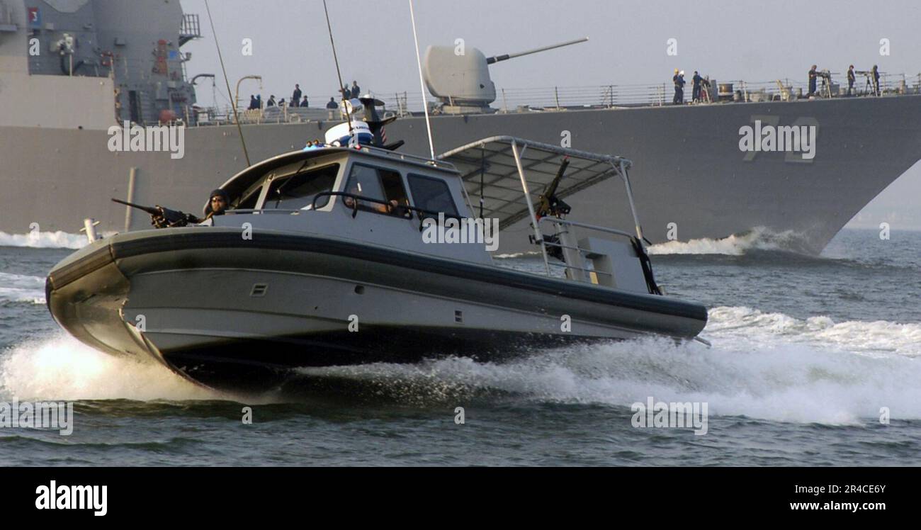 US Navy Naval Expeditionary Combat Command members perform High Value ...