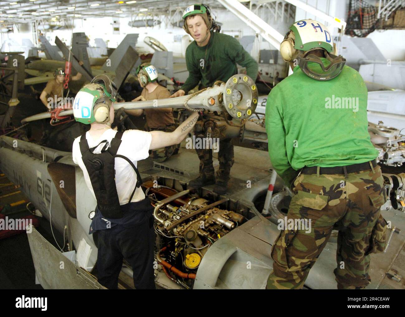 US Navy Maintenance personnel assigned to the Dragonslayers of ...