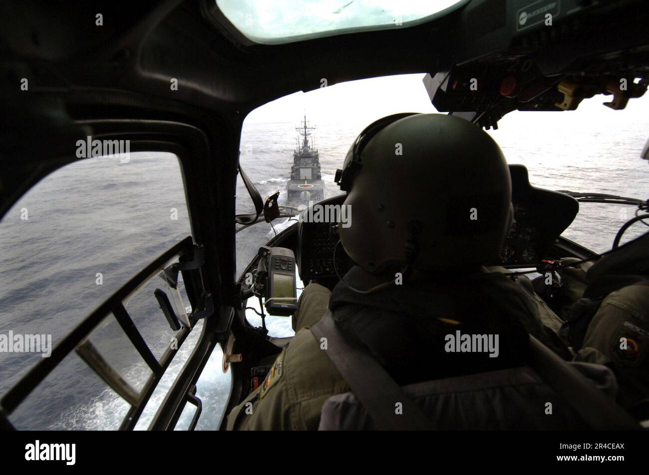 US Navy The pilot of a Colombian helicopter makes his approach while ...