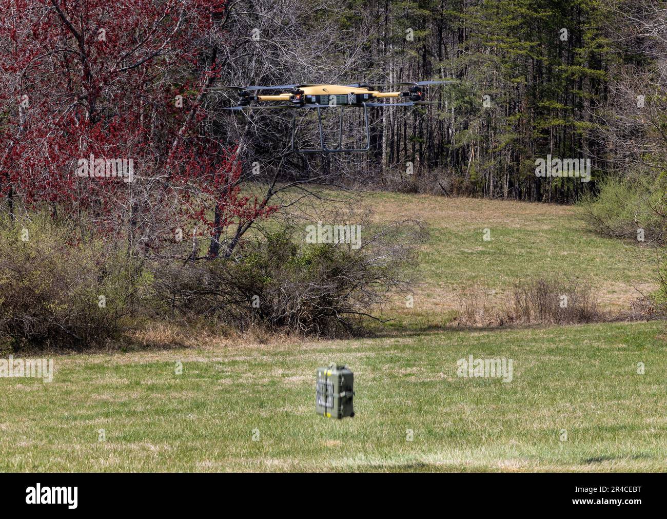The Tactical Resupply Unmanned Aircraft System (TRUAS) drops a ...