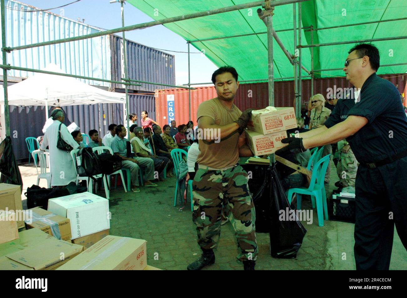 US Navy Navy Storekeeper 2nd Class left, and Machinist's Mate 1st Class ...