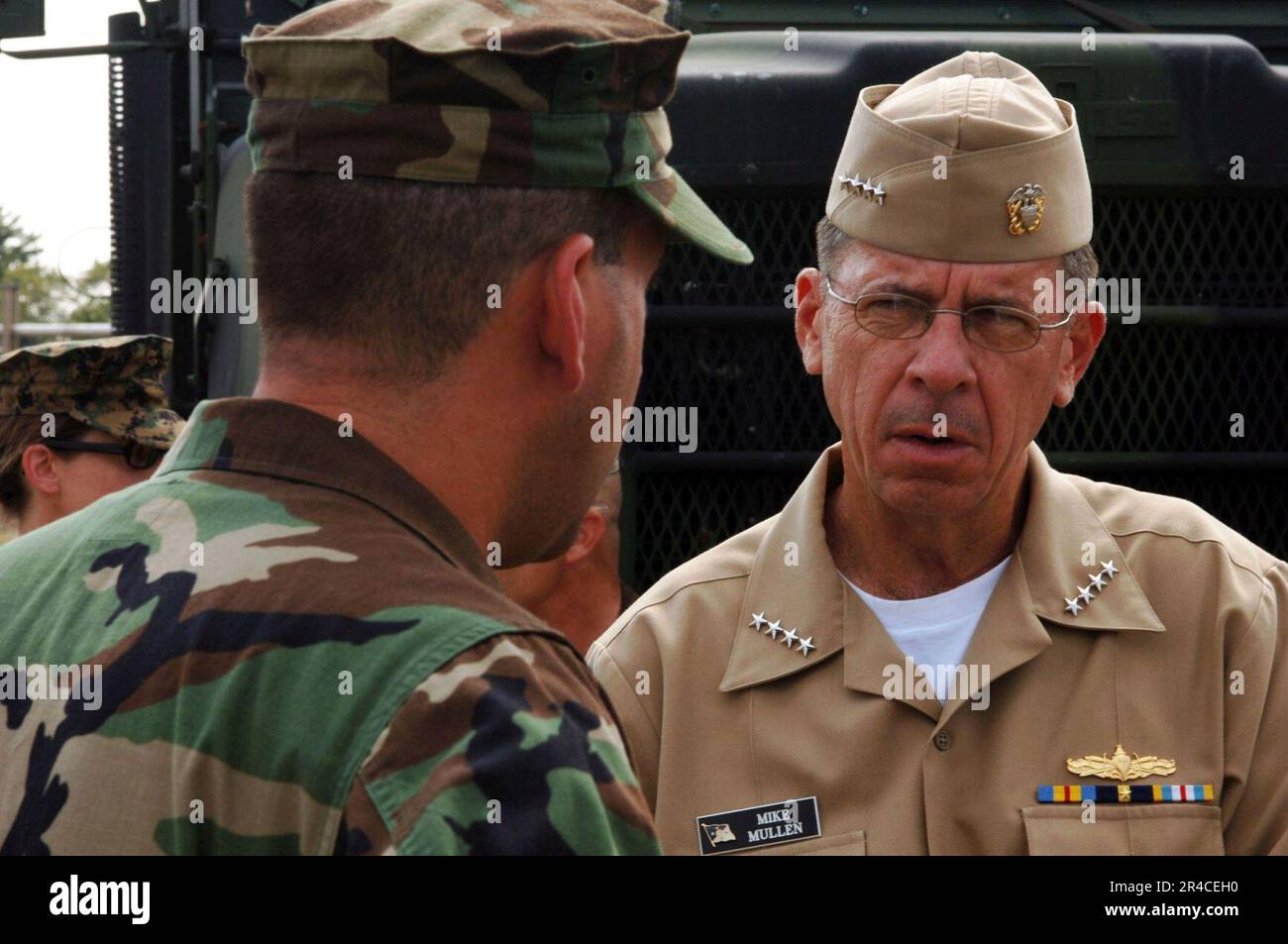 US Navy Chief of Naval Operations (CNO) Adm. Mike Mullen listens to ...