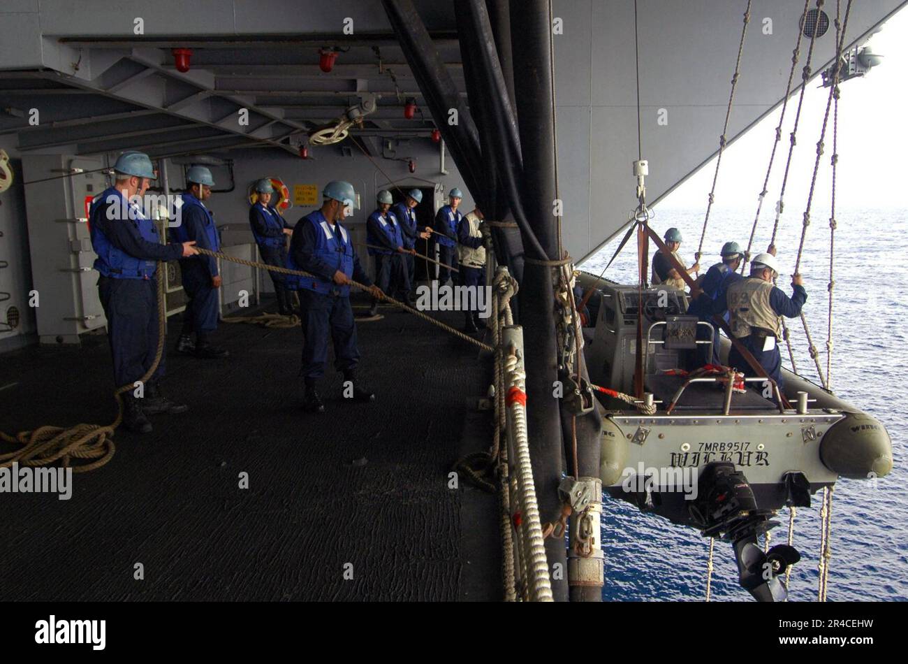US Navy USS Kitty Hawk (CV 63) Deck Department Sailors keep a Rigid ...