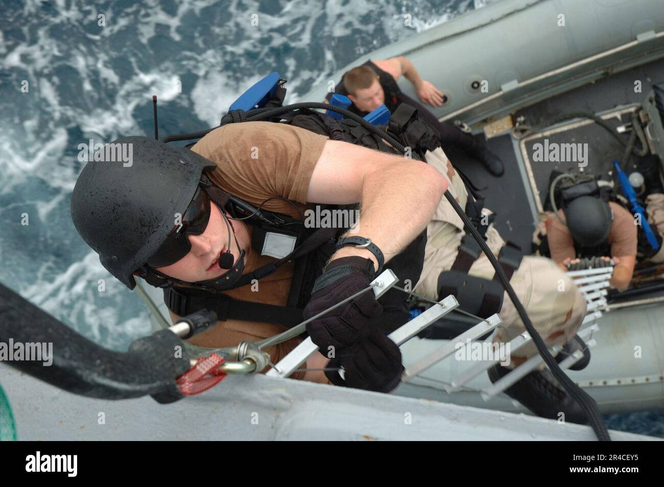 US Navy Fire Controlman 3rd Class successfully climbs the hook-and-pull ...