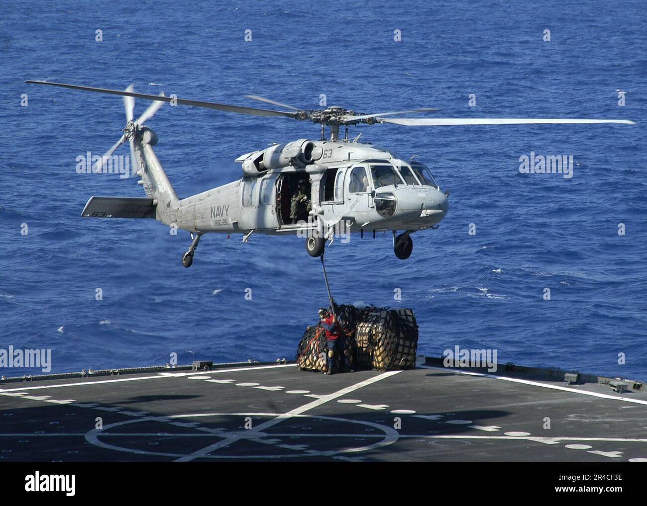 US Navy A MH-60S Knighthawk helicopter assigned to Helicopter Sea ...