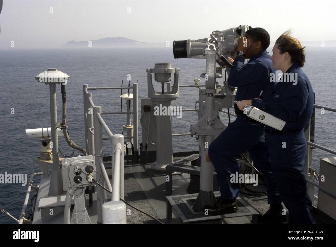 US Navy Intelligence Specialist 2nd Class center, and Intelligence ...