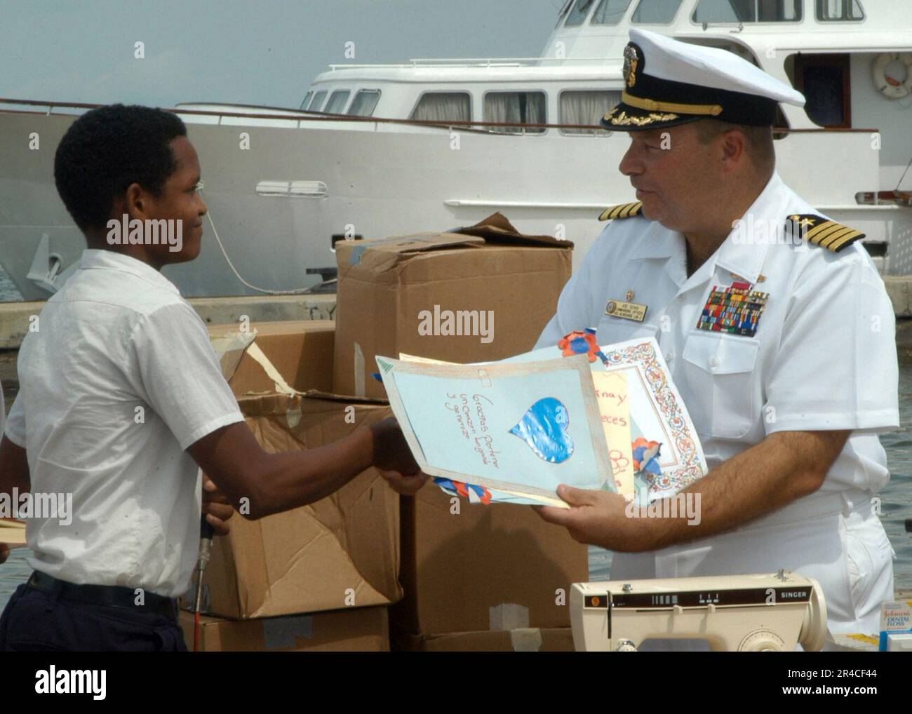 US Navy USS Kearsarge (LHD 3) Commanding Officer Capt. accepts letters ...