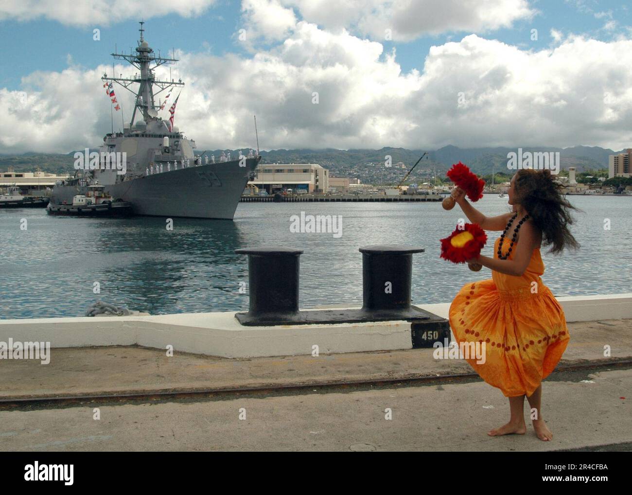 US Navy A Polynesian dancer welcomes home Sailors from the guided ...