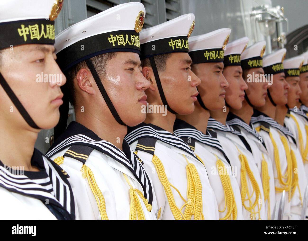 US Navy Sailors aboard the Chinese Navy destroyer Qingdao (DDG 113 ...