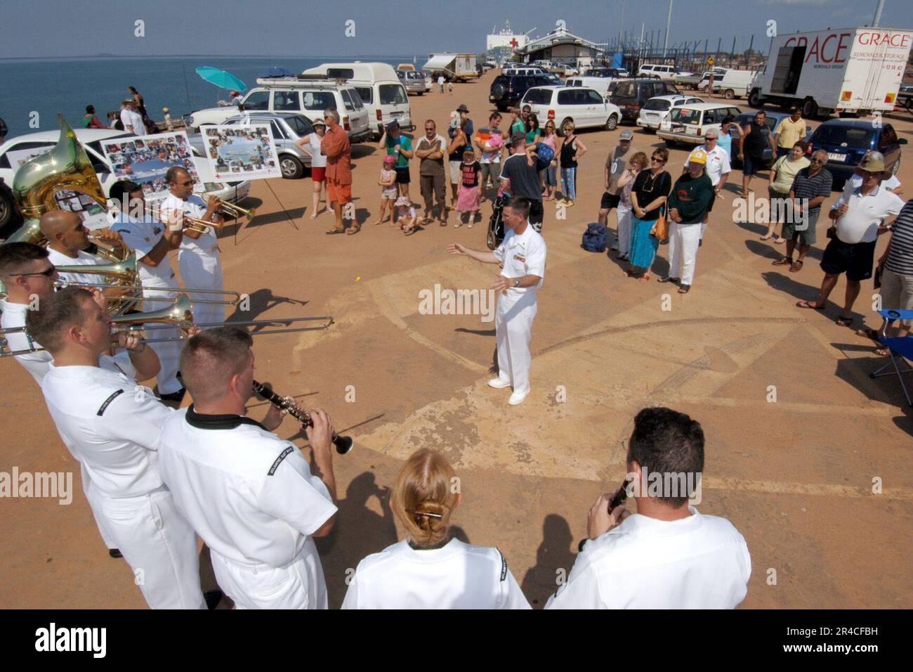 US Navy Chief Musician conducts the U.S. Navy Show Band against the ...