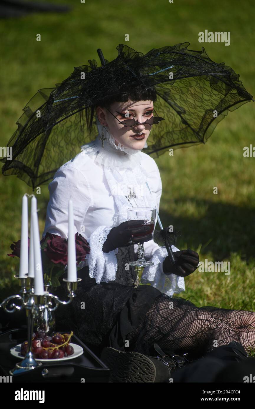 A participant attends the Victorian Picnic at the city park in Leipzig ...