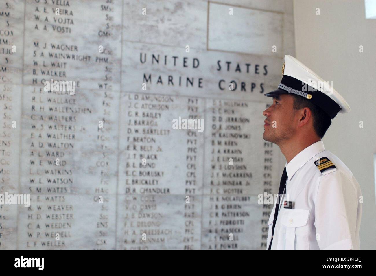 US Navy A Sailor from the Chinese Navy views the shrine area of USS ...