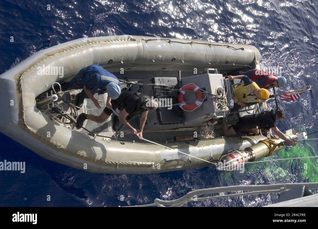 US Navy Sailors assigned to the Arleigh Burke-class guided missile ...