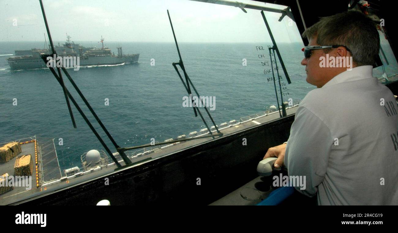 US Navy Air Boss Cmdr. observes the Military Sealift Command combat ...