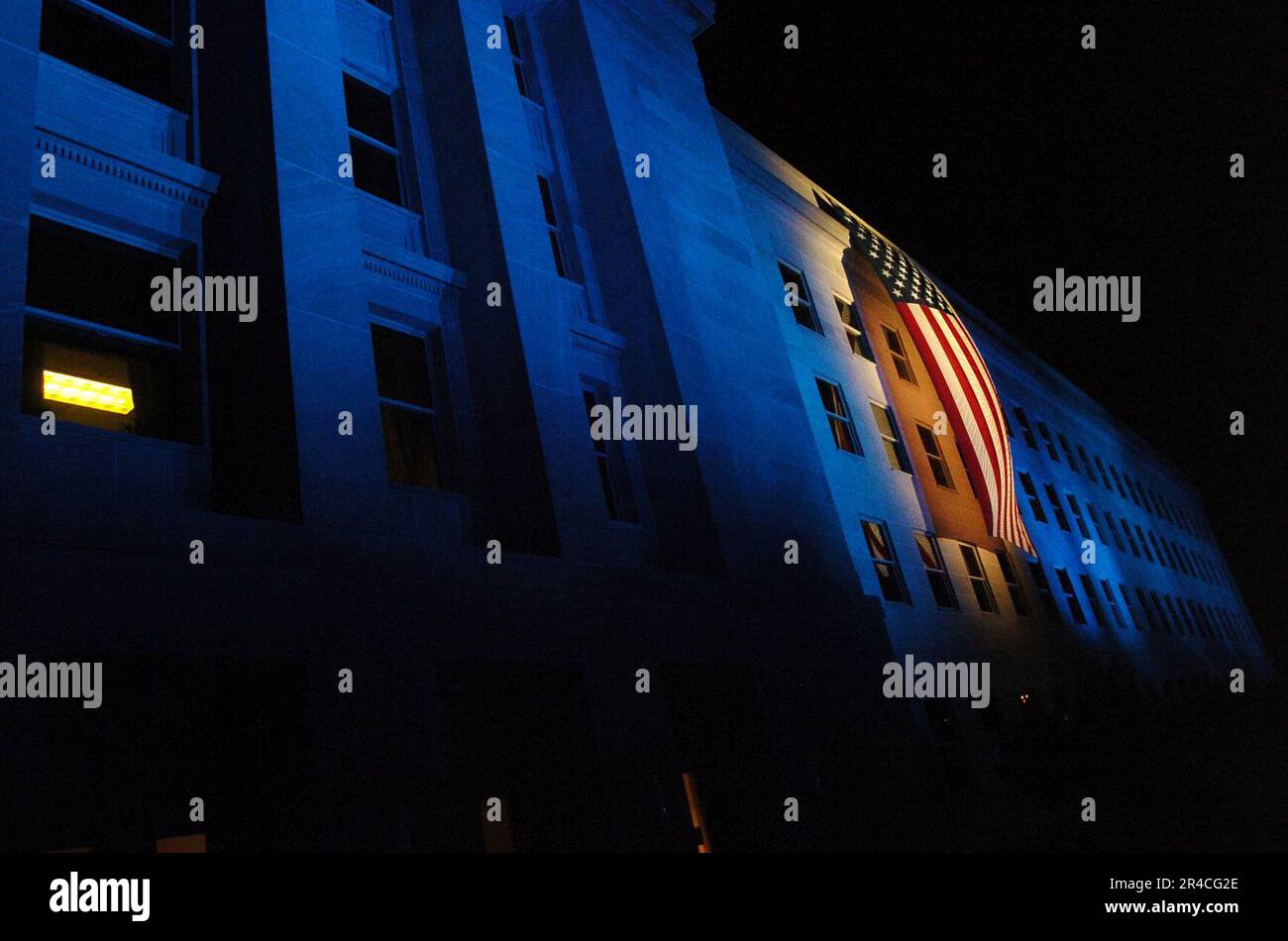 US Navy A memorial flag and lights illuminate the spot where American ...