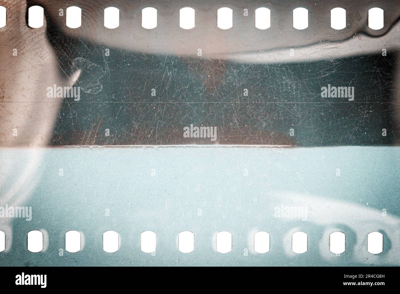 Dusty and grungy 35mm film texture or surface. Perforated scratched ...