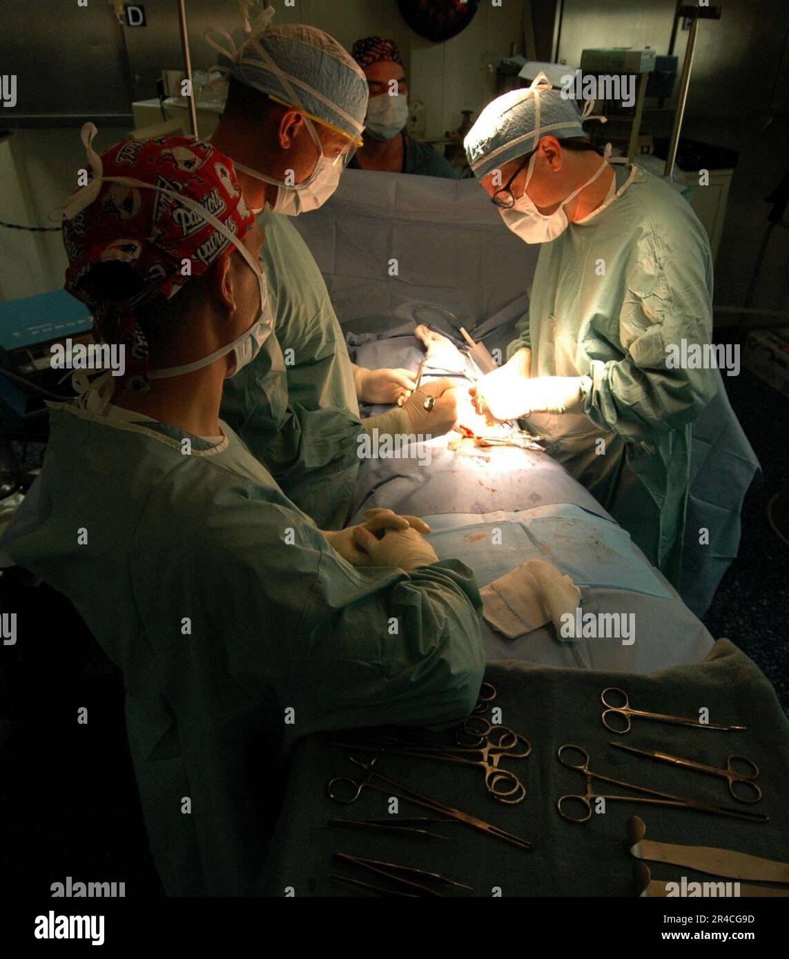 US Navy Lt. Cmdr. Fleet Surgical Team 5's lead surgeon, performs ...