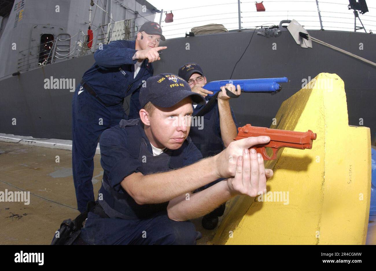 US Navy Fire Controlman 1st Class instructs Sonar Technician 3rd Class ...